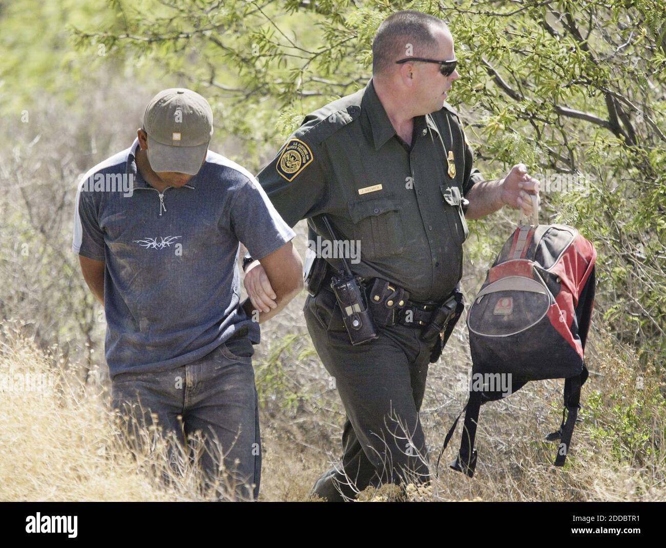 NO FILM, NO VIDEO, NO TV, NO DOCUMENTARY - U.S. Border Patrol officer ...