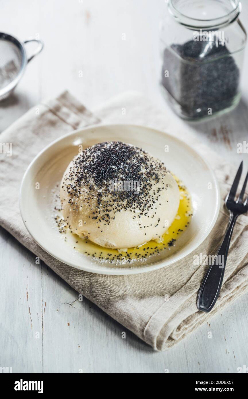 Sweet Germknodel dumpling with poppy seeds Stock Photo - Alamy