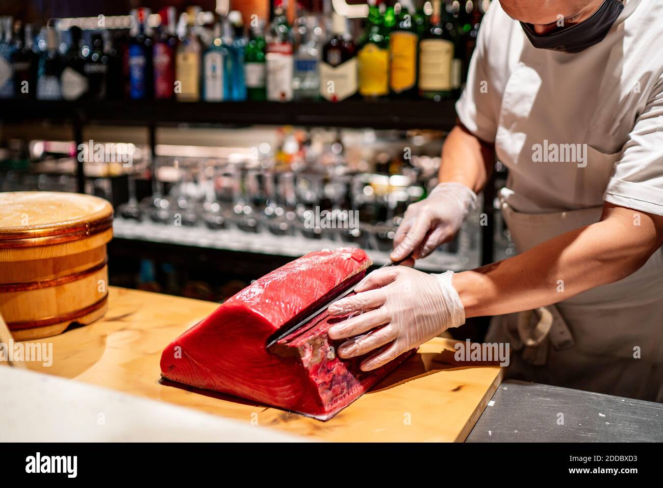 Person cutting fish hi-res stock photography and images - Alamy