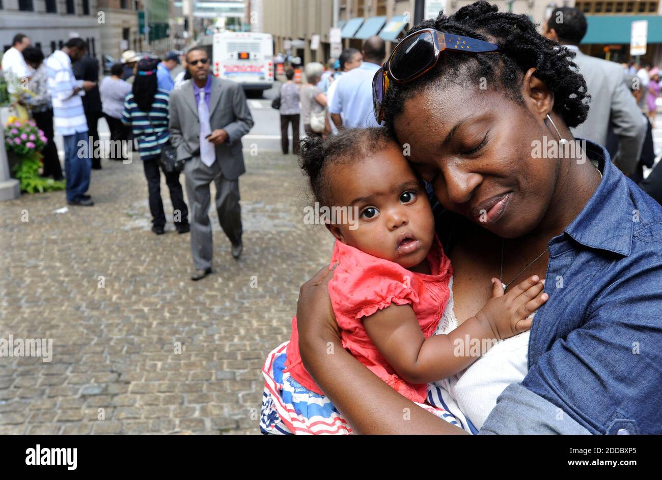 NO FILM, NO VIDEO, NO TV, NO DOCUMENTARY - Chanel Jenkins holds her ...