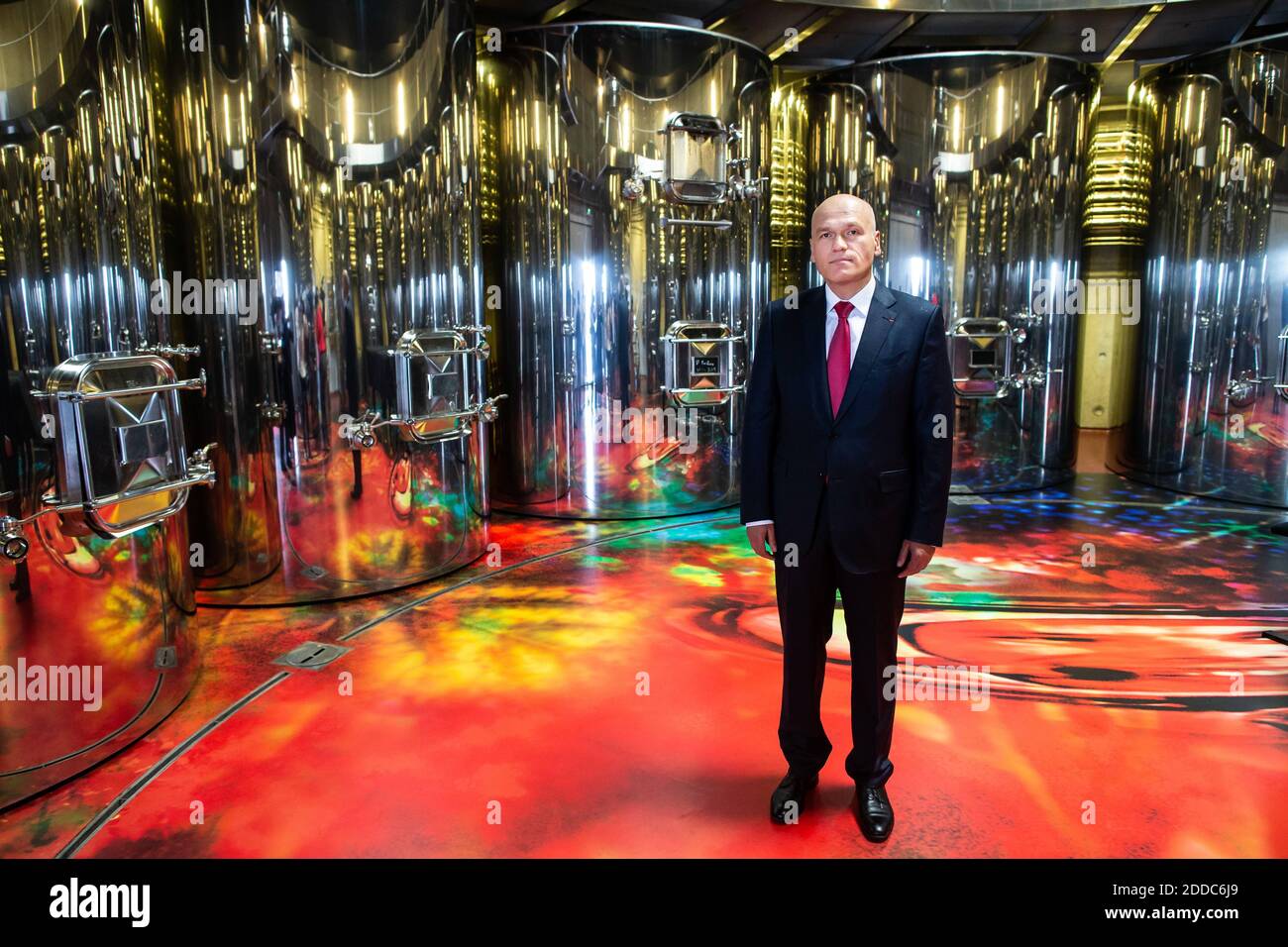 Owner Andrey Filatov poses for pictures in the cellar of the Chateau La ...