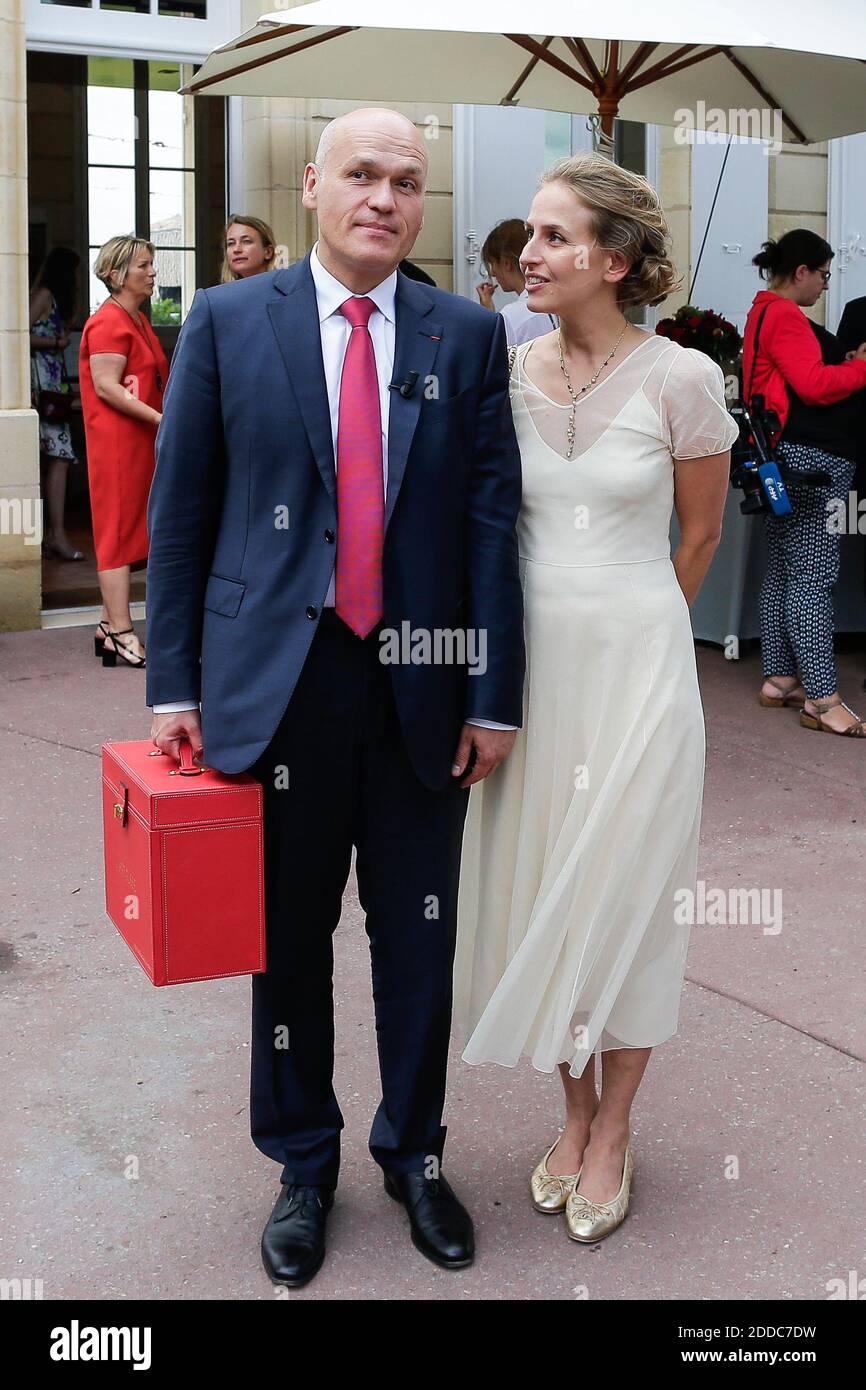 Owner Andrey Filatov and his wife Elena Filatov pose for pictures ...