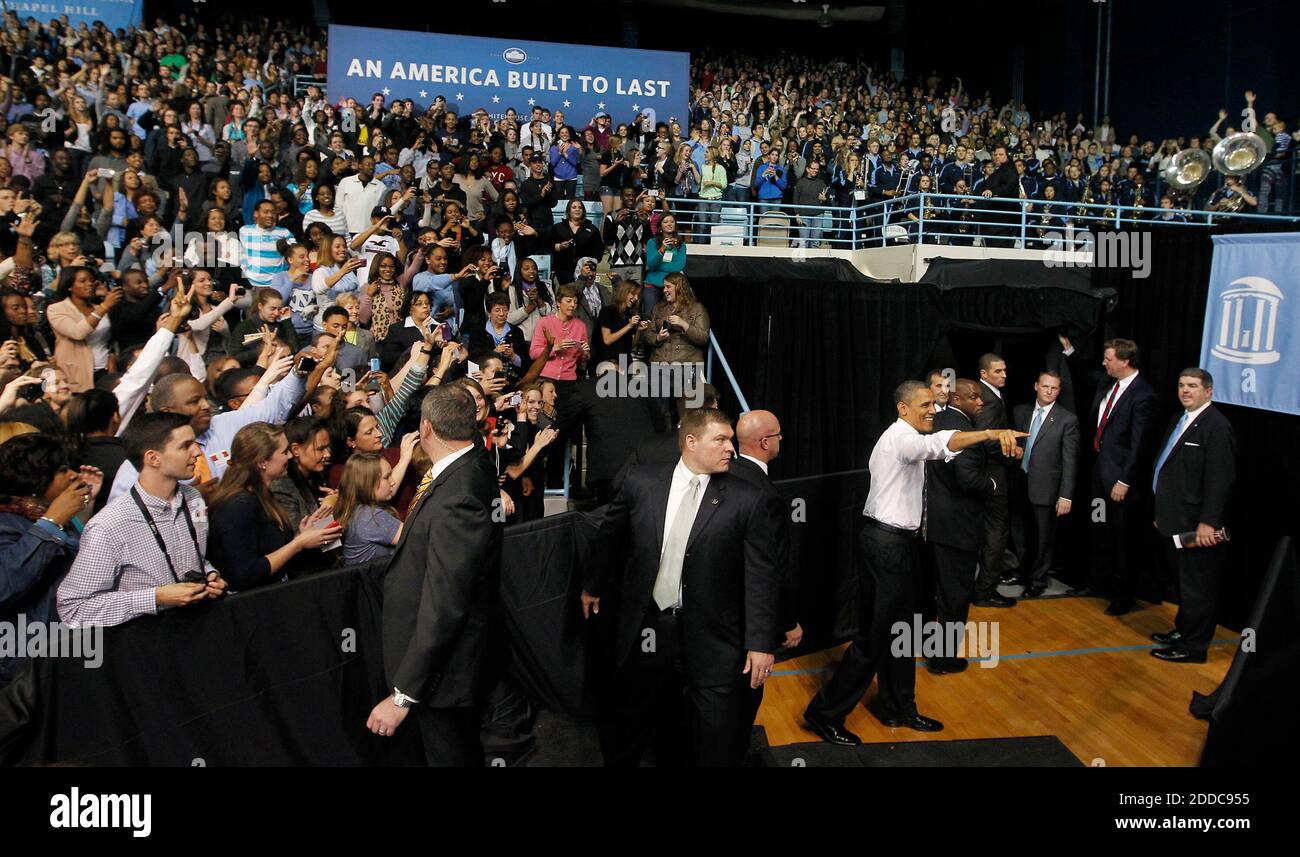 NO FILM, NO VIDEO, NO TV, NO DOCUMENTARY - President Barack Obama waves ...