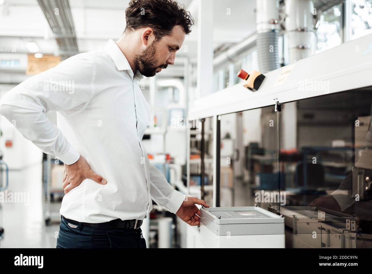 Businessman standing back view hi-res stock photography and images - Alamy