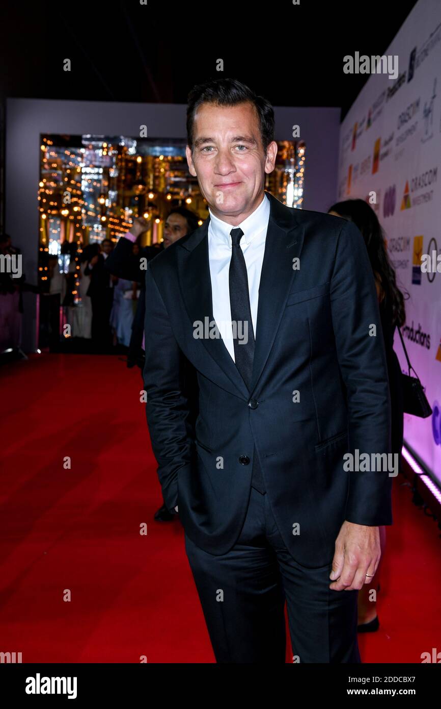 British actor Clive Owen walks the red carpet as he arrives for the ...