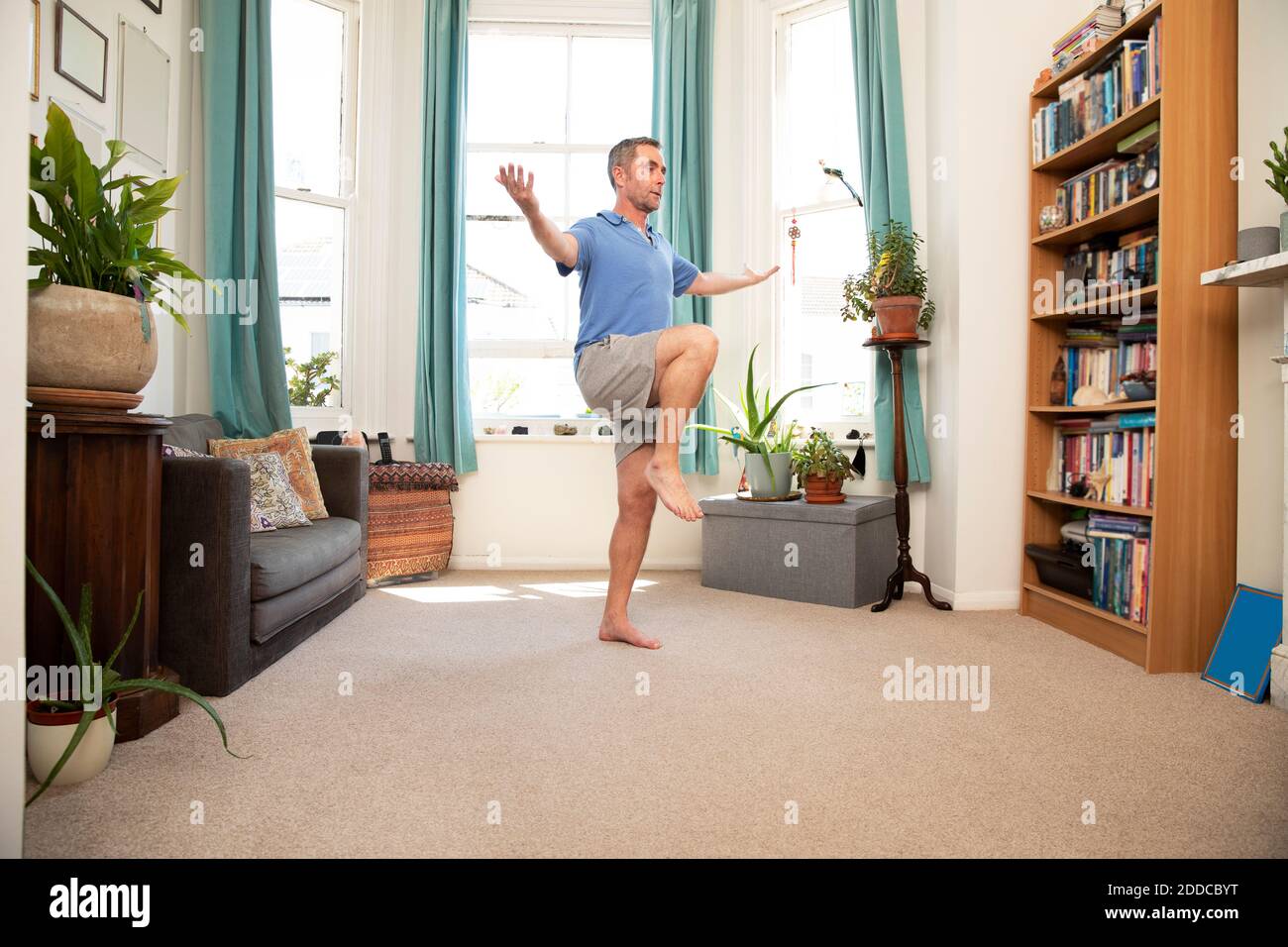 Balancing one leg exercise hi-res stock photography and images - Alamy