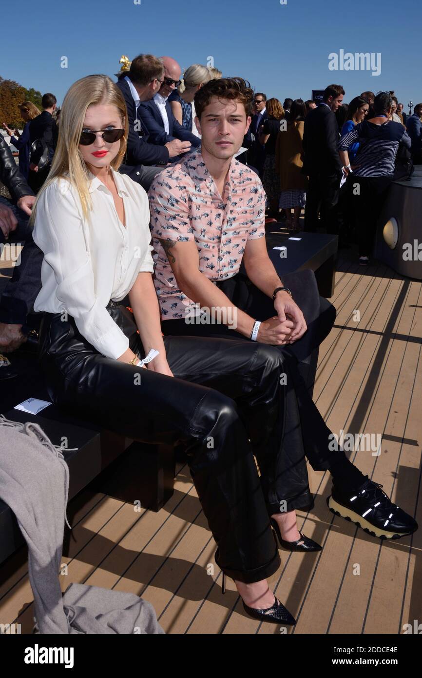 Toni Garrn and Francisco Lachowski attending the L'Oreal Fashion Show ...