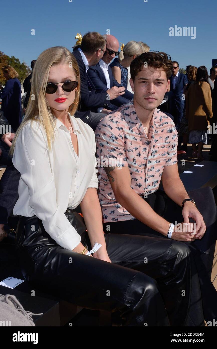 Toni Garrn and Francisco Lachowski attending the L'Oreal Fashion Show ...
