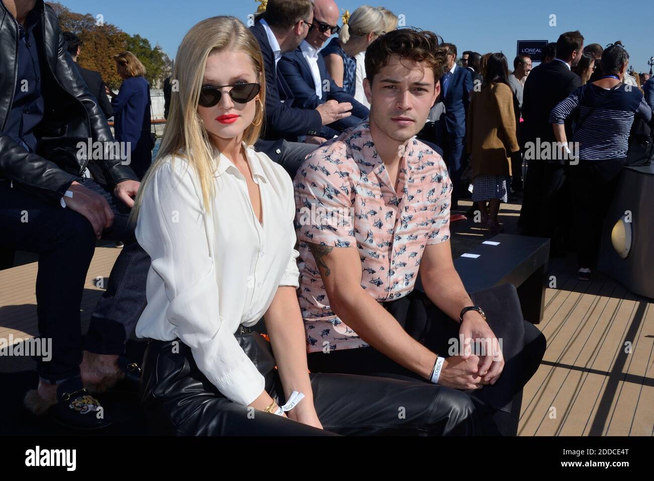 Toni Garrn and Francisco Lachowski attending the L'Oreal Fashion Show ...