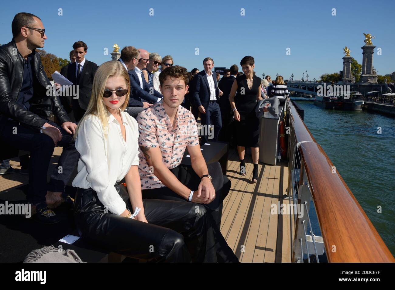 Toni Garrn and Francisco Lachowski attending the L'Oreal Fashion Show ...
