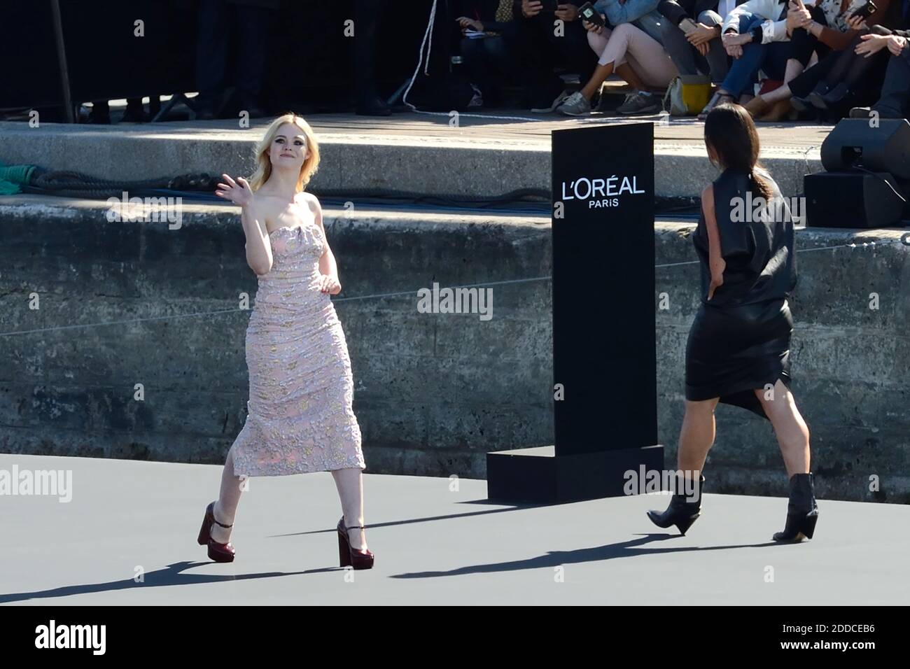 Elle Fanning walks the runway during the L'Oreal Fashion Show as part ...