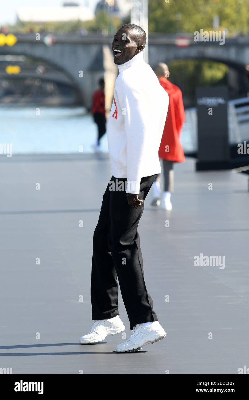 Alpha Dia walks the runway during Le Defile L'Oreal Paris as part of ...
