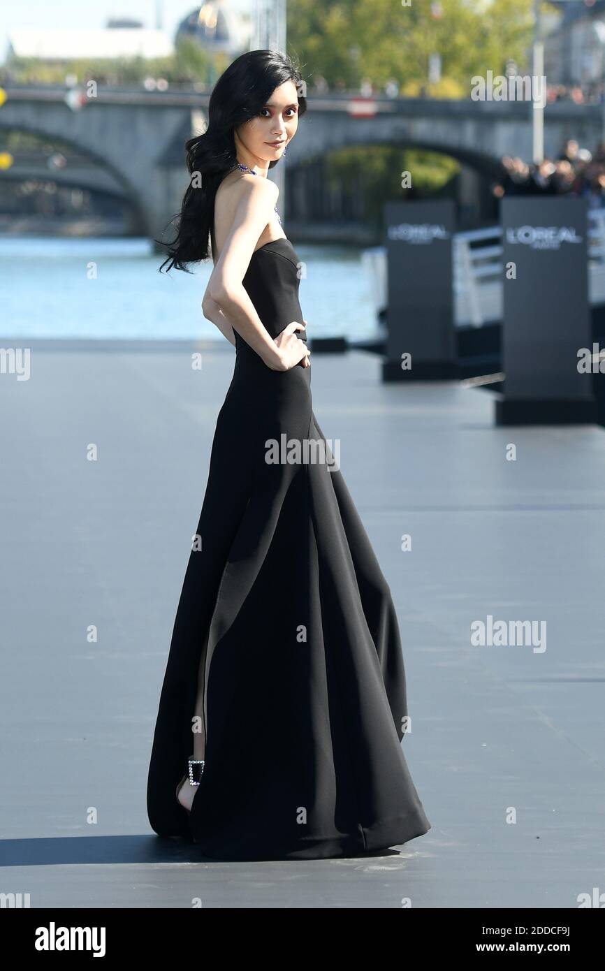 Ming Xi walks the runway during Le Defile L'Oreal Paris as part of ...