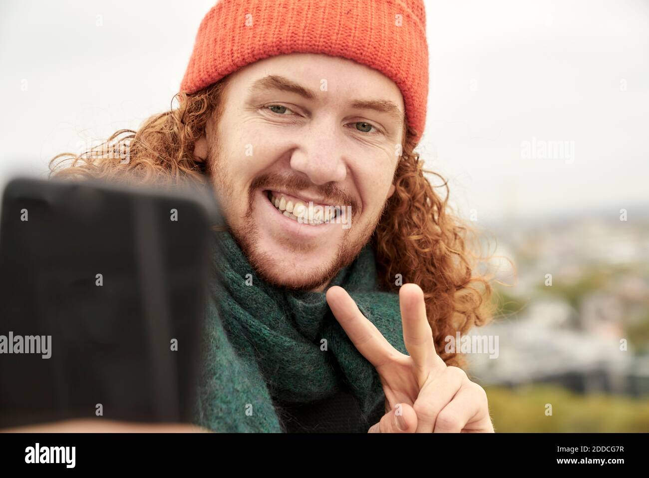 Man holding peace sign hi-res stock photography and images - Alamy
