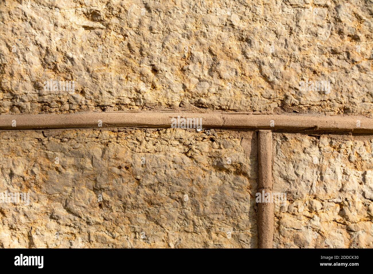 Handcarved sandstone wall closeup detail Stock Photo - Alamy