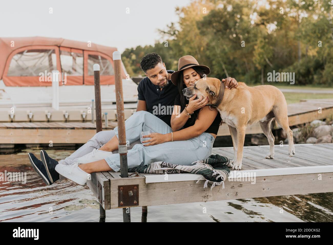 Sitting on pier hi-res stock photography and images - Alamy