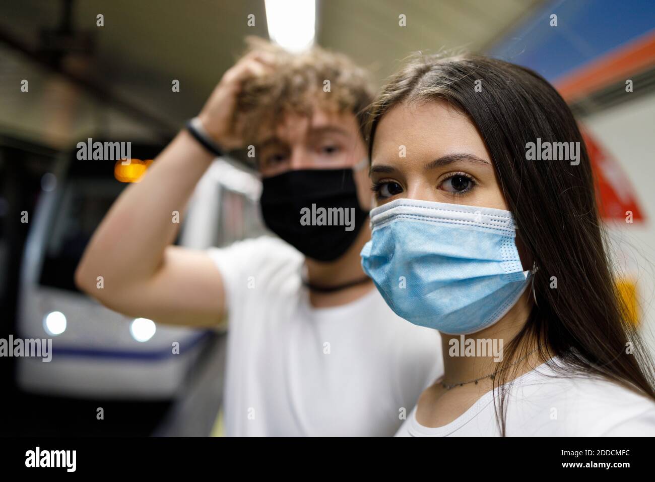 Masks on subway hi-res stock photography and images - Alamy