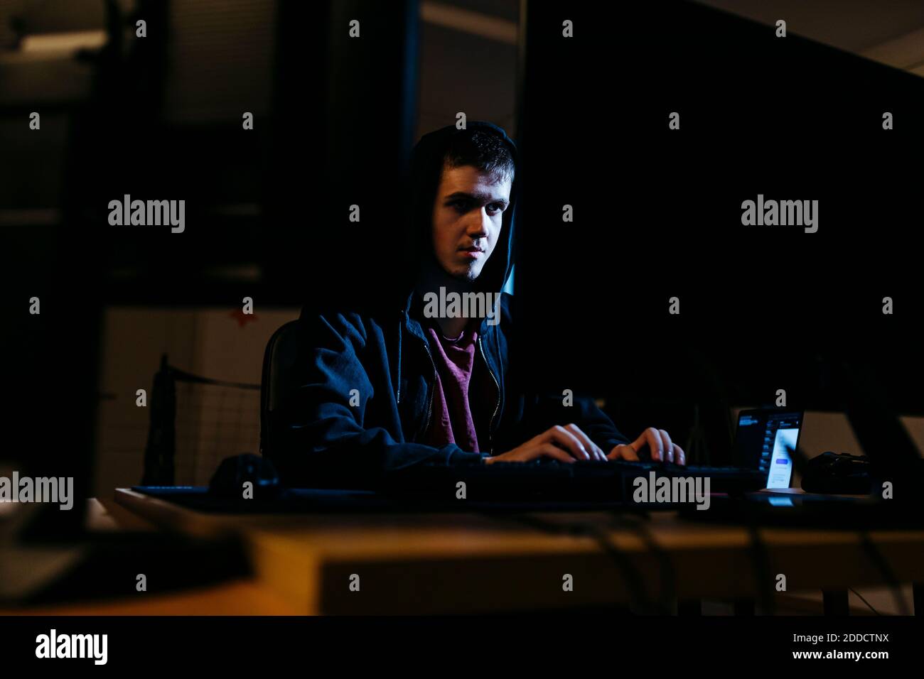 Hacker man on computer hi-res stock photography and images - Alamy