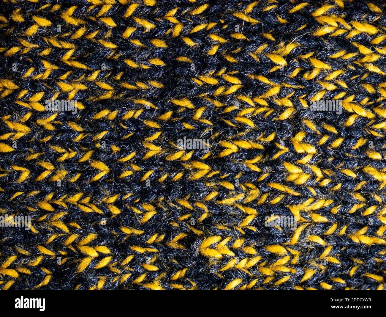Knitting texture background yellow and black background Stock Photo - Alamy