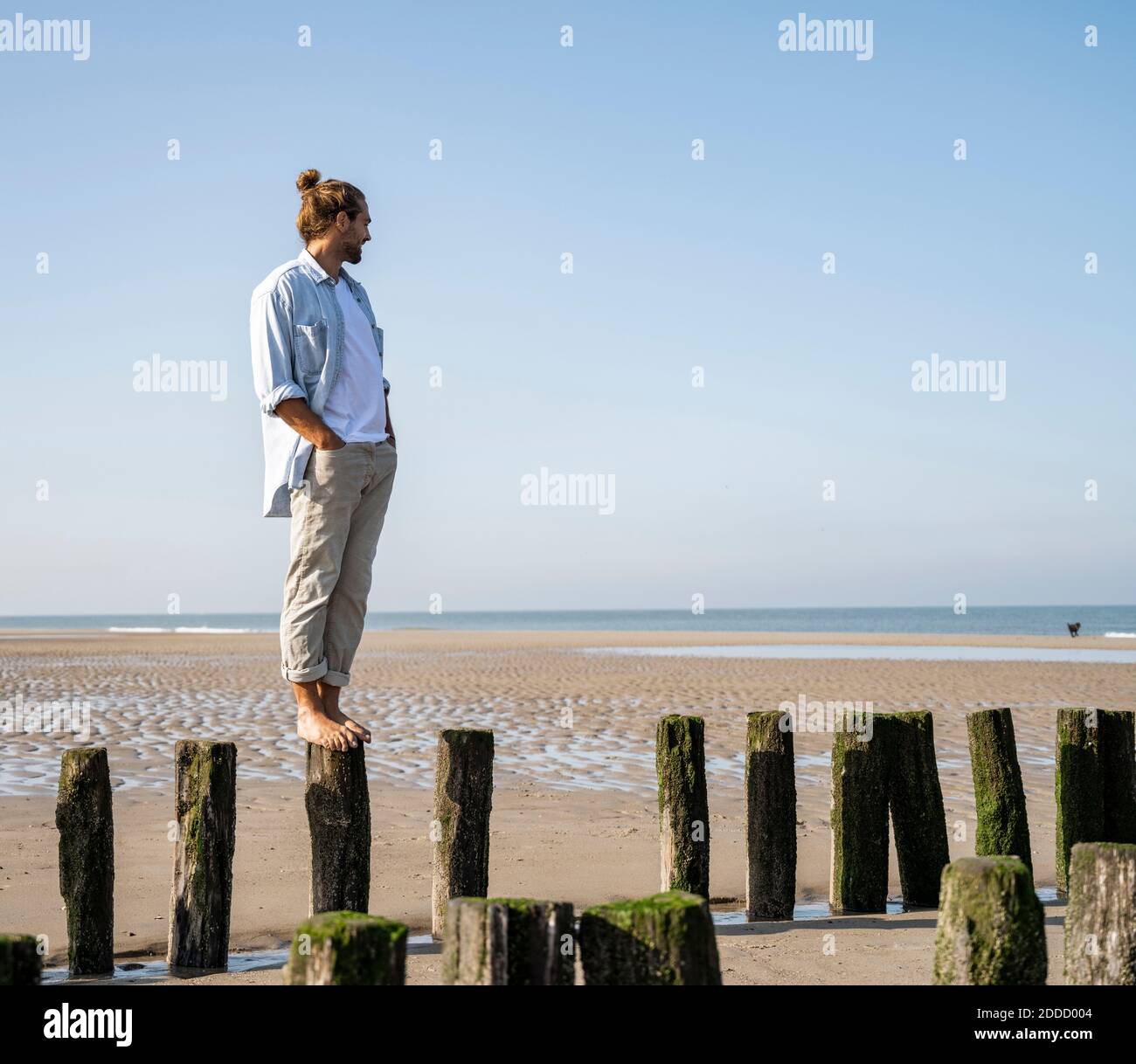 Man Standing Sideways Facing Right