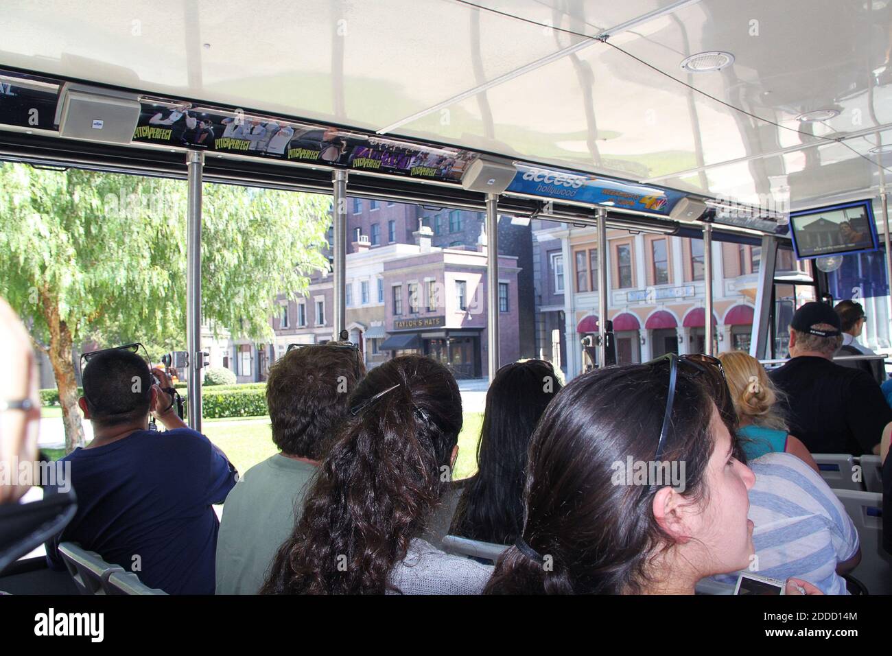 Group of people on Studio tour called Backlot tour. Ride attraction at ...