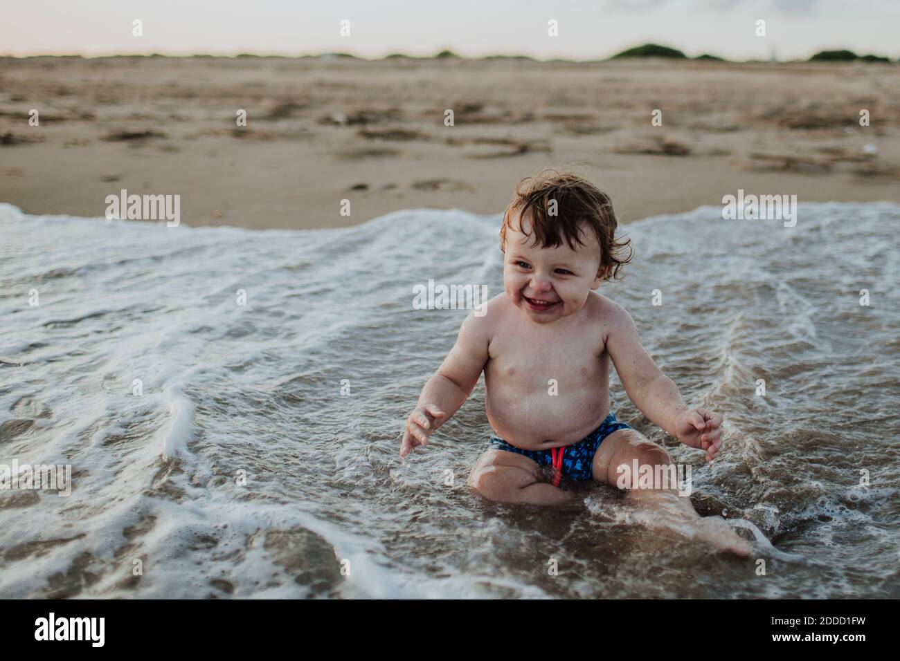 Cute baby in water hi-res stock photography and images - Alamy