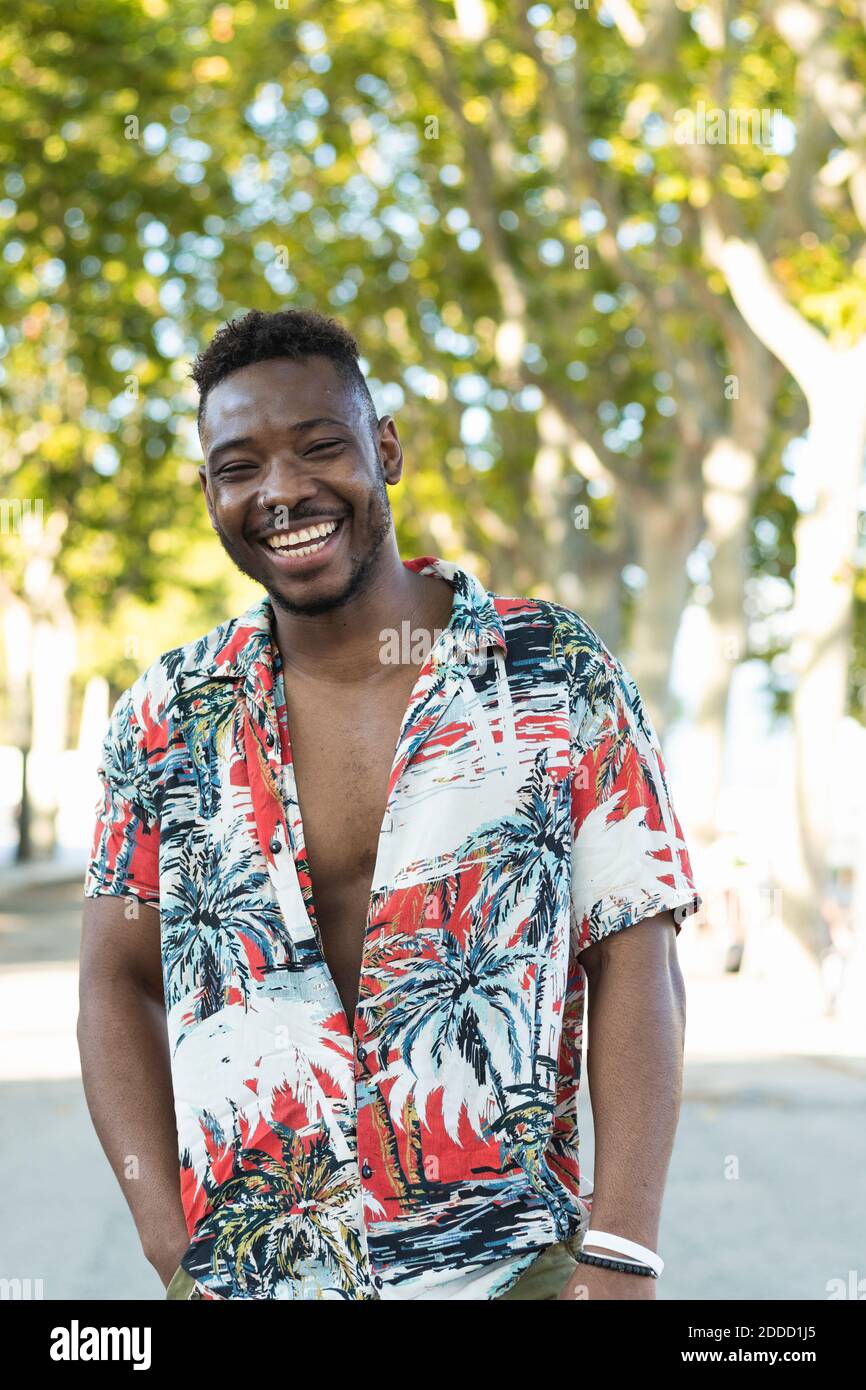 Young man standing in the street hi-res stock photography and images ...