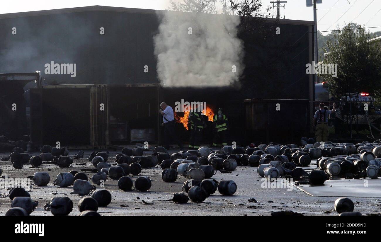 NO FILM, NO VIDEO, NO TV, NO DOCUMENTARY - Firefighters continue to ...