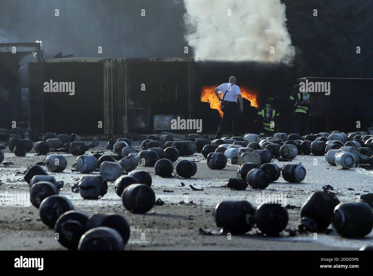 NO FILM, NO VIDEO, NO TV, NO DOCUMENTARY - Firefighters continue to ...