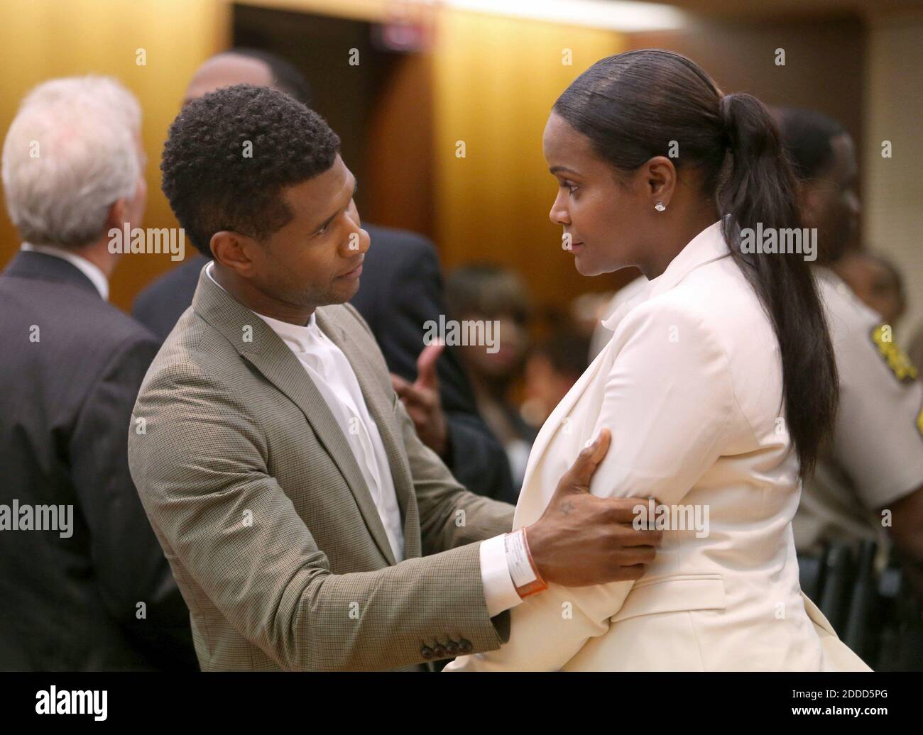 Usher And Wife In Court