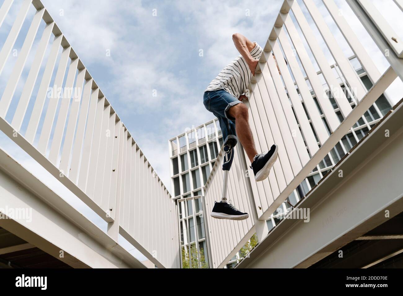 Man crossing bridge hi-res stock photography and images - Alamy