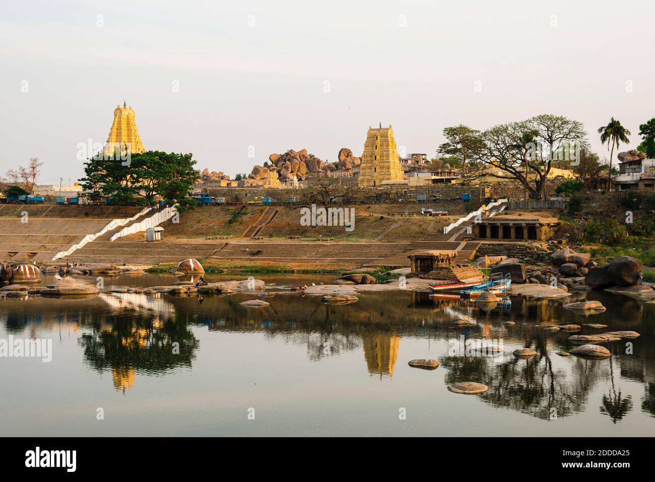 Reflection of Virupaksha Temple seen in lake at Hampi, Karnataka, India ...