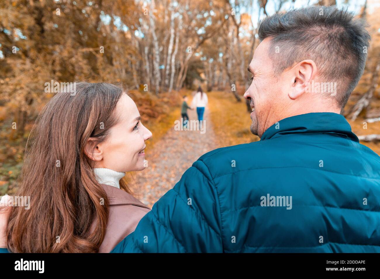 Boy looking behind rear view hi-res stock photography and images - Alamy
