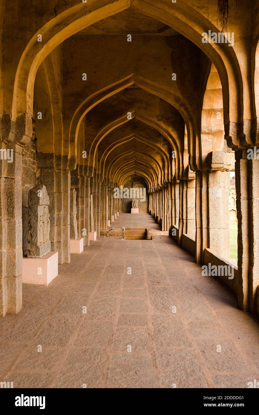 India, Karnataka, Hampi, Granite Elephant Stables complex in desert ...