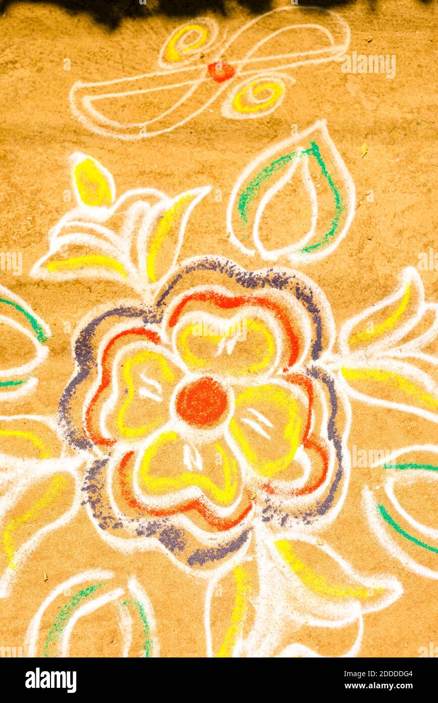 High angle view of floral rangoli design on footpath at Hampi ...