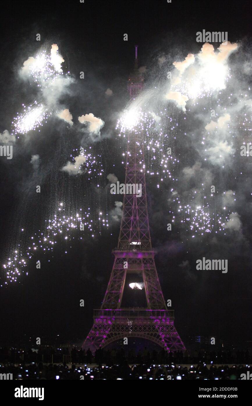 Fireworks explode from the Eiffel Tower during the annual Bastille Day celebration, on July 14 ...