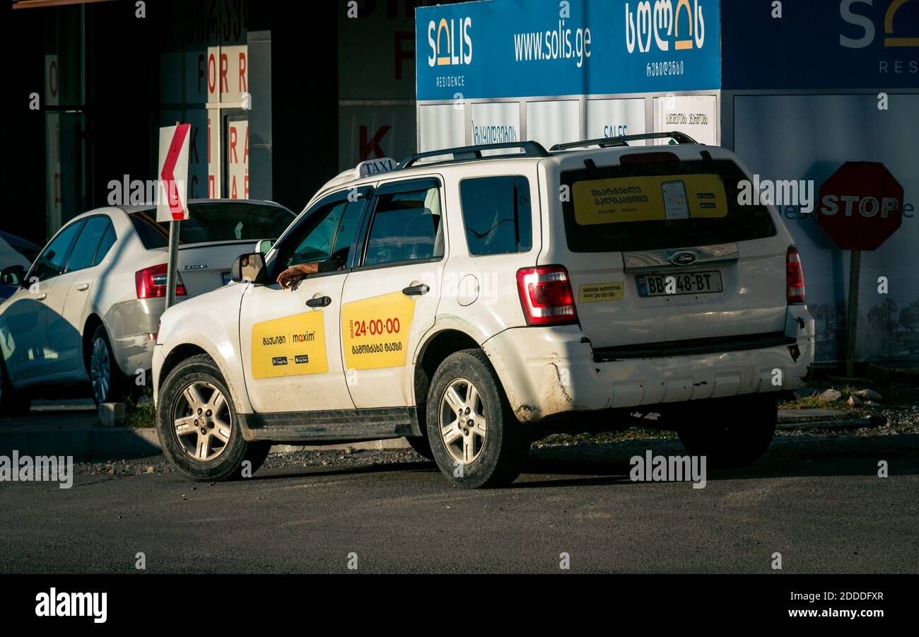 Batumi. Georgia - October 21, 2020:Maxim taxi on the streets of Batum ...
