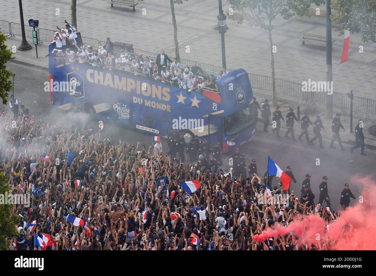 The Bus of France's World Cup Winning Team Parade Down The Champs ...