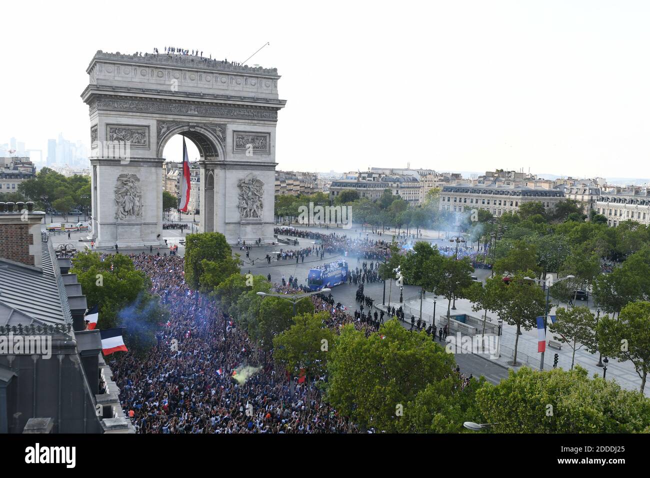 The Bus of France's World Cup Winning Team Parade Down The Champs ...
