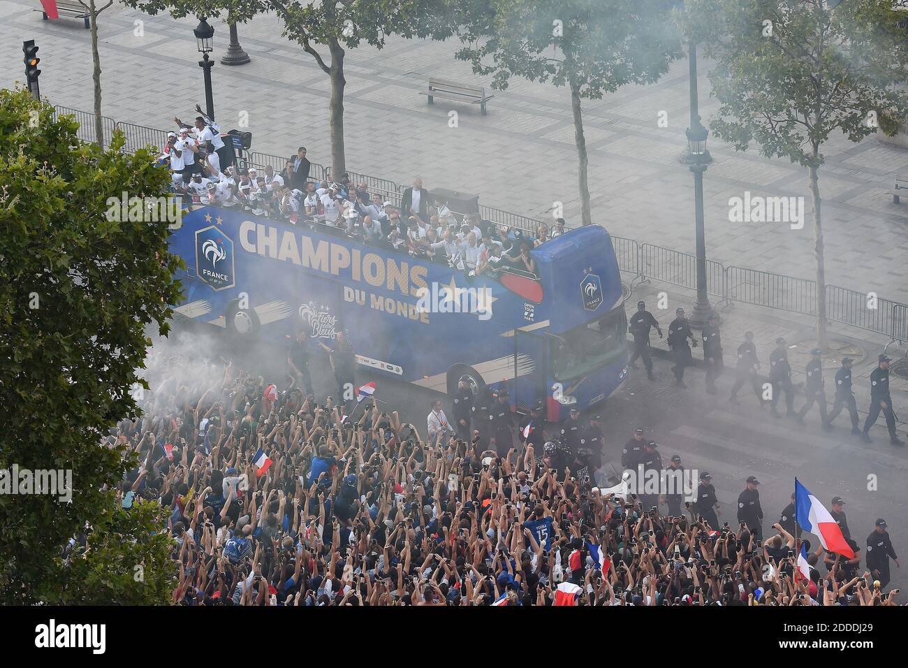 The Bus of France's World Cup Winning Team Parade Down The Champs ...
