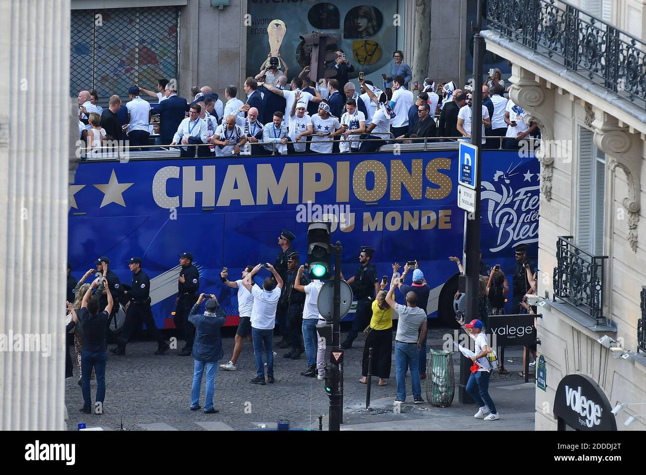 The Bus of France's World Cup Winning Team Parade Down The Champs ...