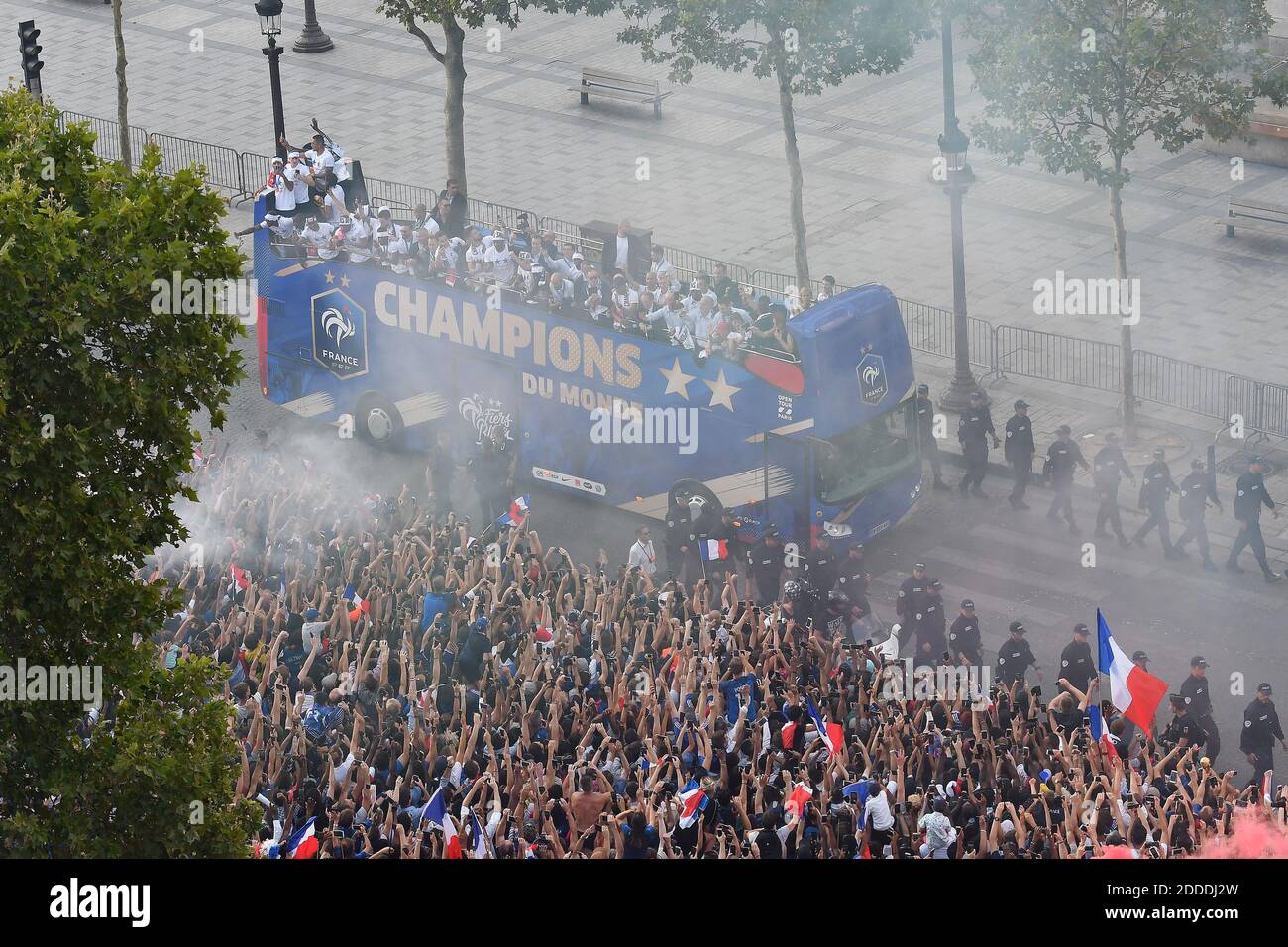 The Bus of France's World Cup Winning Team Parade Down The Champs ...