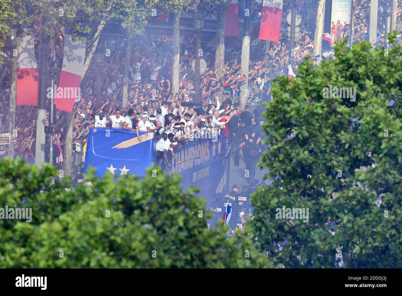 The Bus of France's World Cup Winning Team Parade Down The Champs ...
