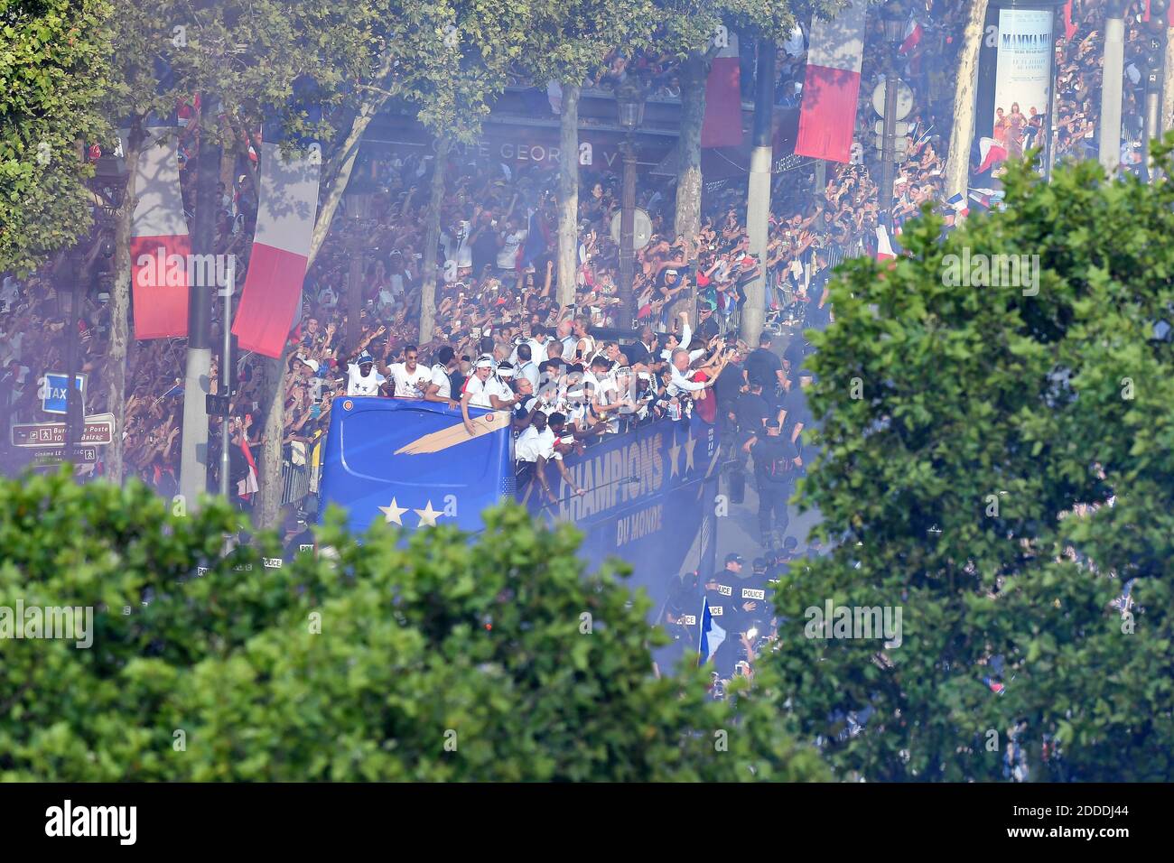 The Bus of France's World Cup Winning Team Parade Down The Champs ...