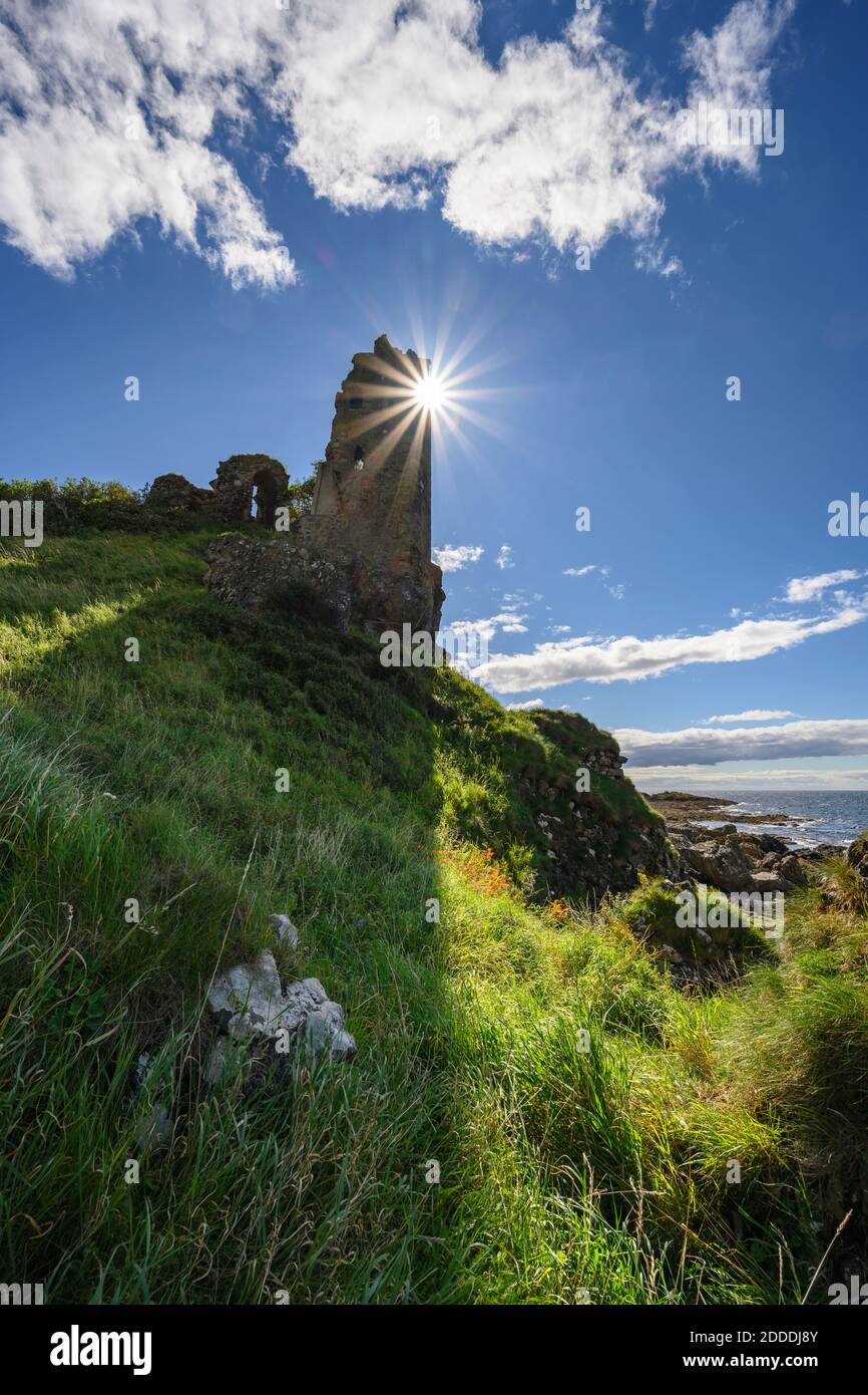 Sun shining over ruins of dunure castle hi-res stock photography and ...