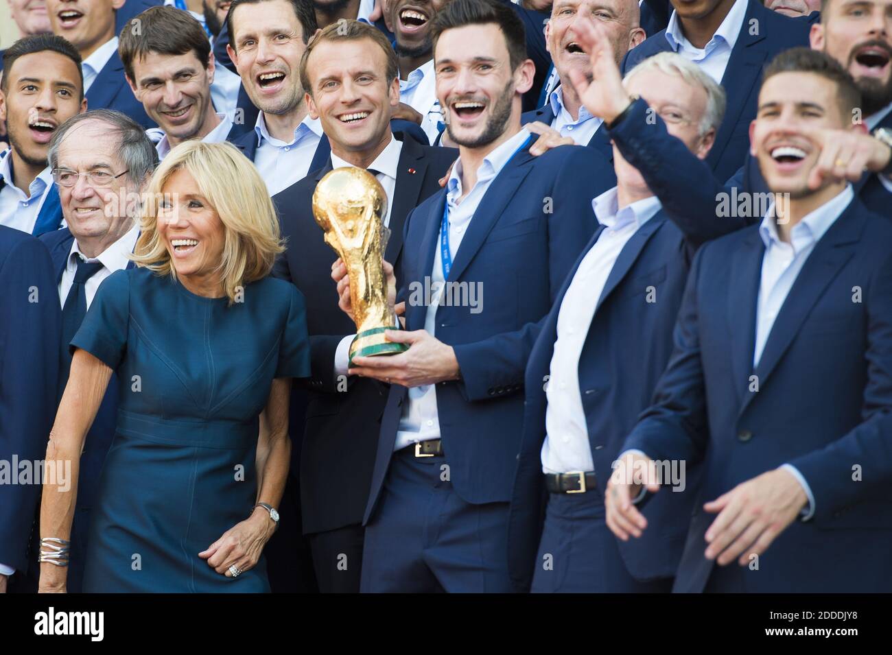 French President Emmanuel Macron, his wife Brigitte Macron, head coach ...