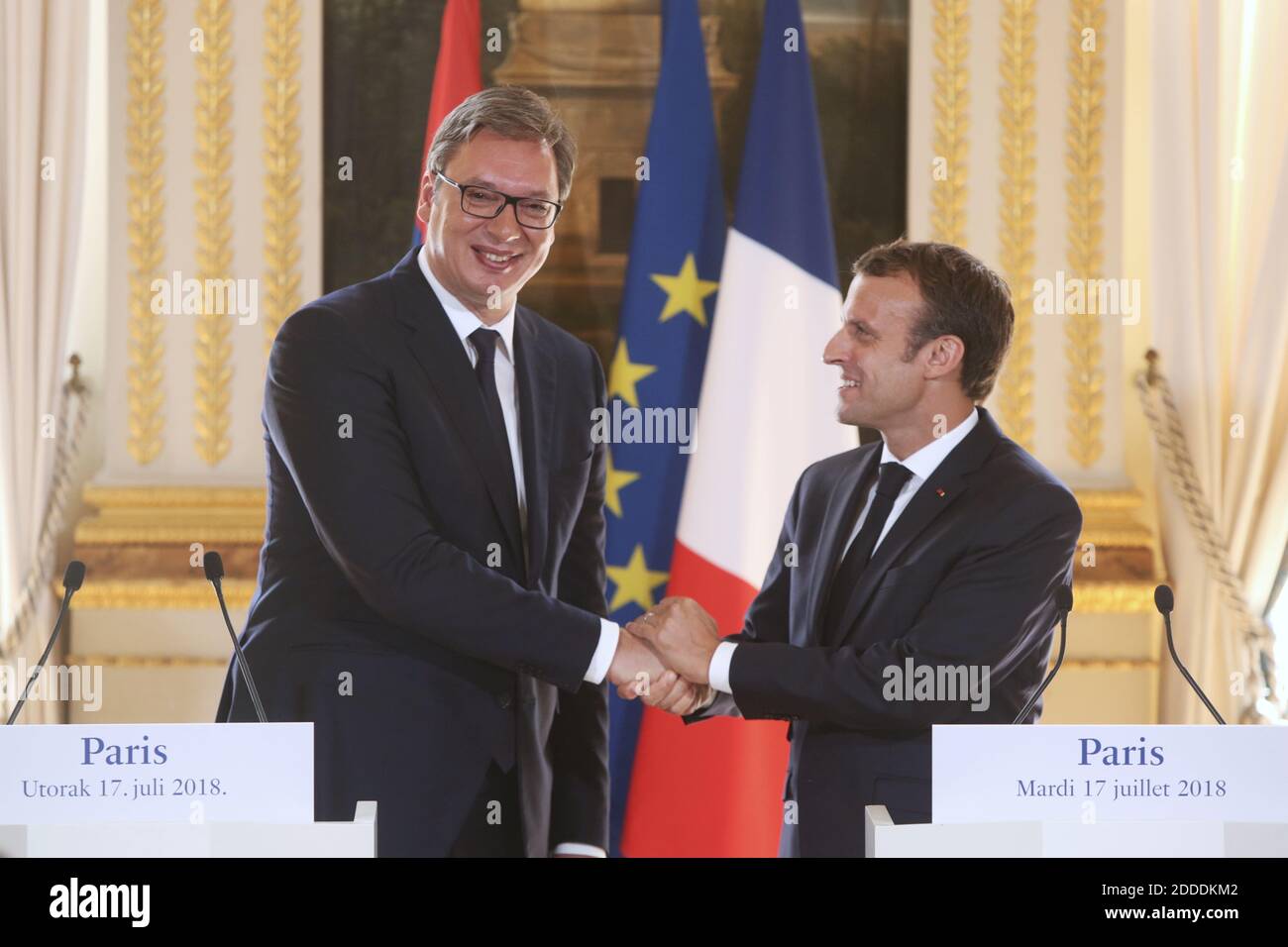 French President Emmanuel Macron (R) and his Serbian counterpart ...