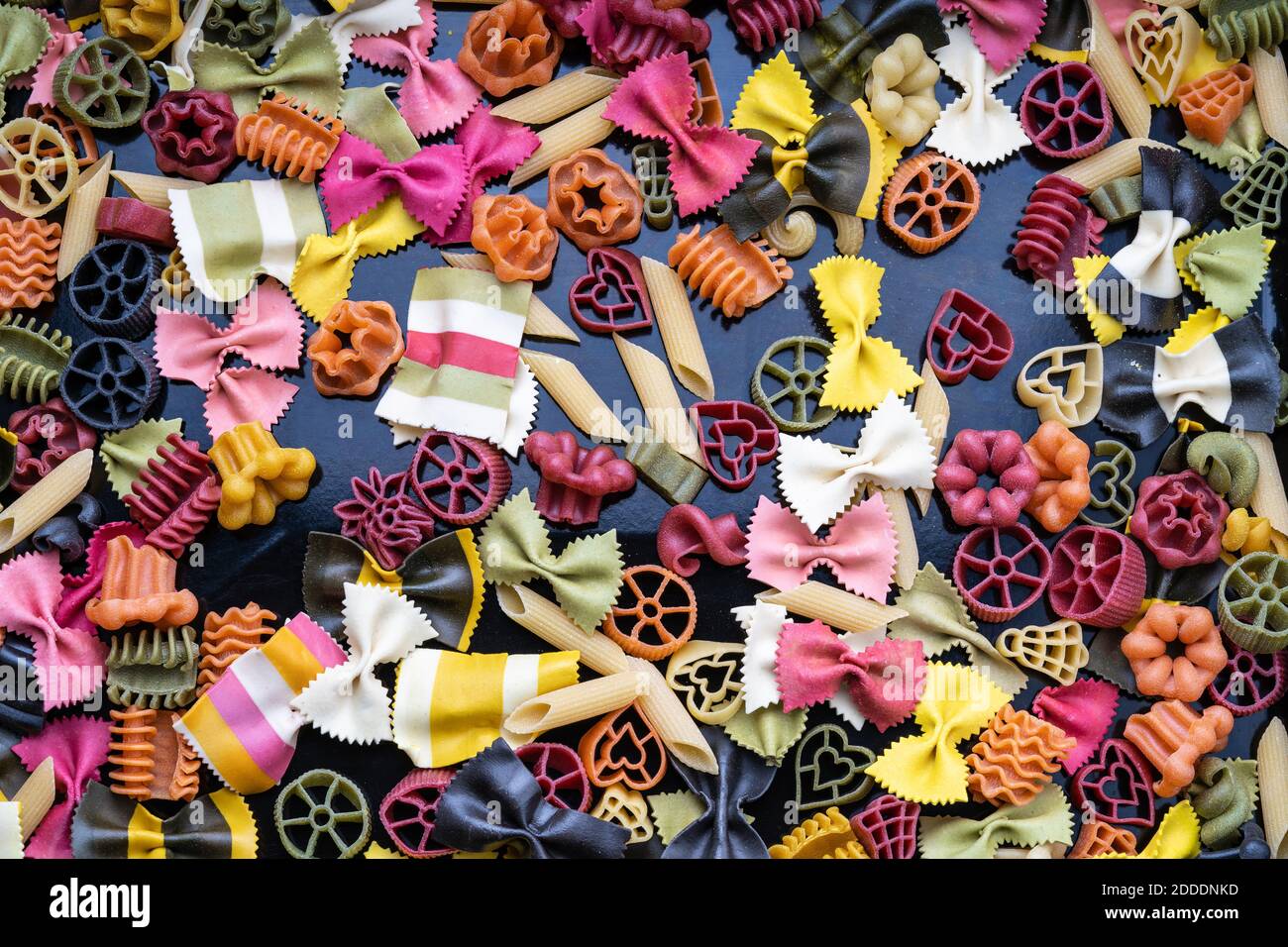 Cheerful colorful italian pasta. Different types of Italian pasta lying ...