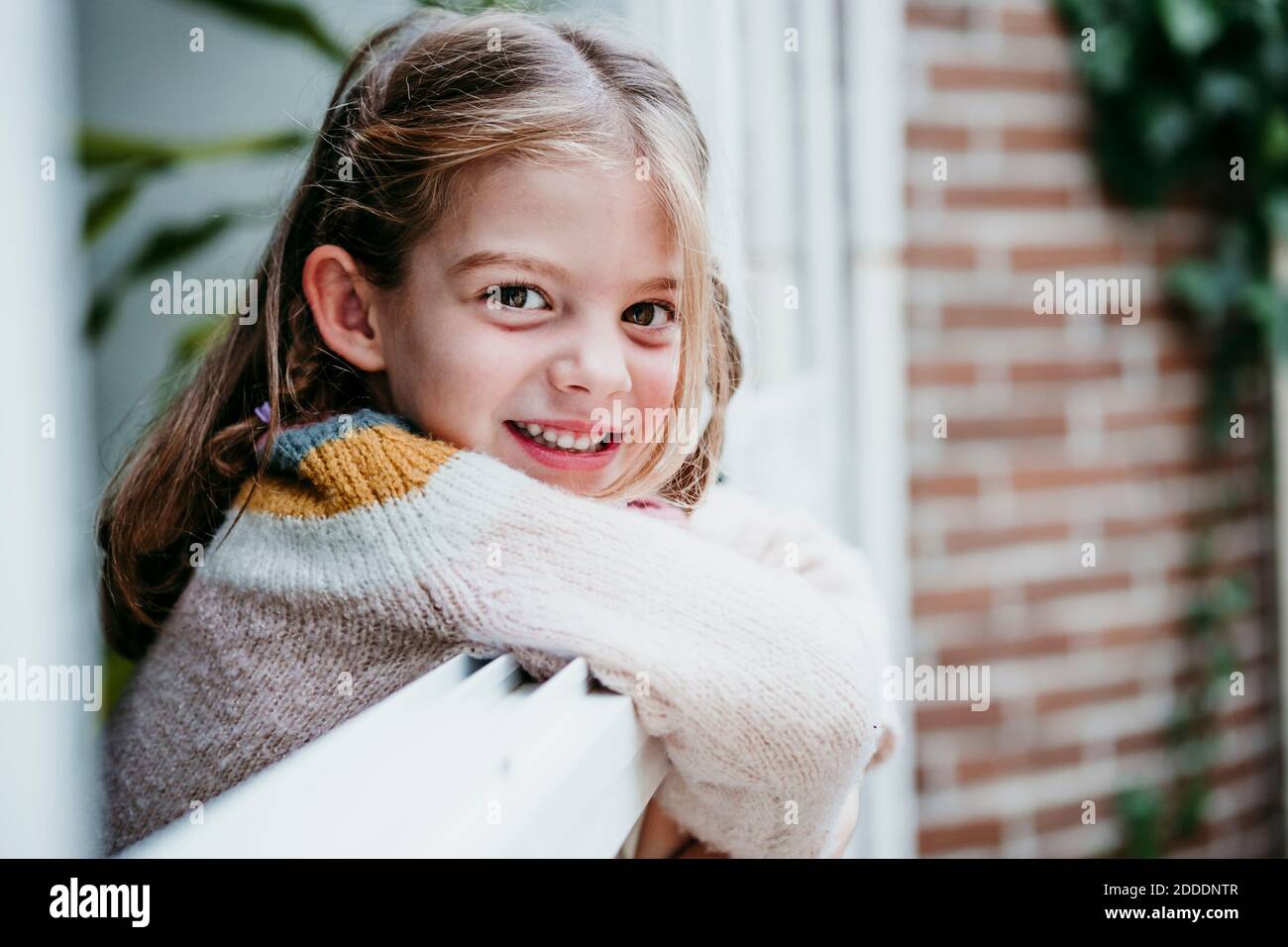 Leaning on window hi-res stock photography and images - Alamy