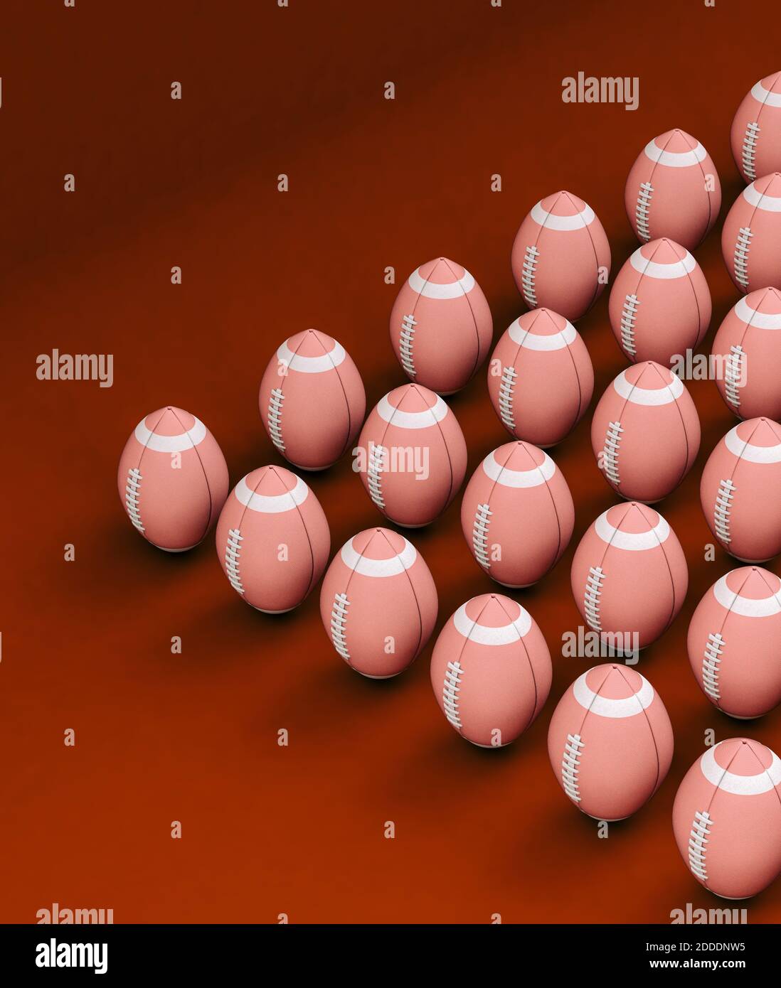 Rugby balls standing against red background Stock Photo - Alamy